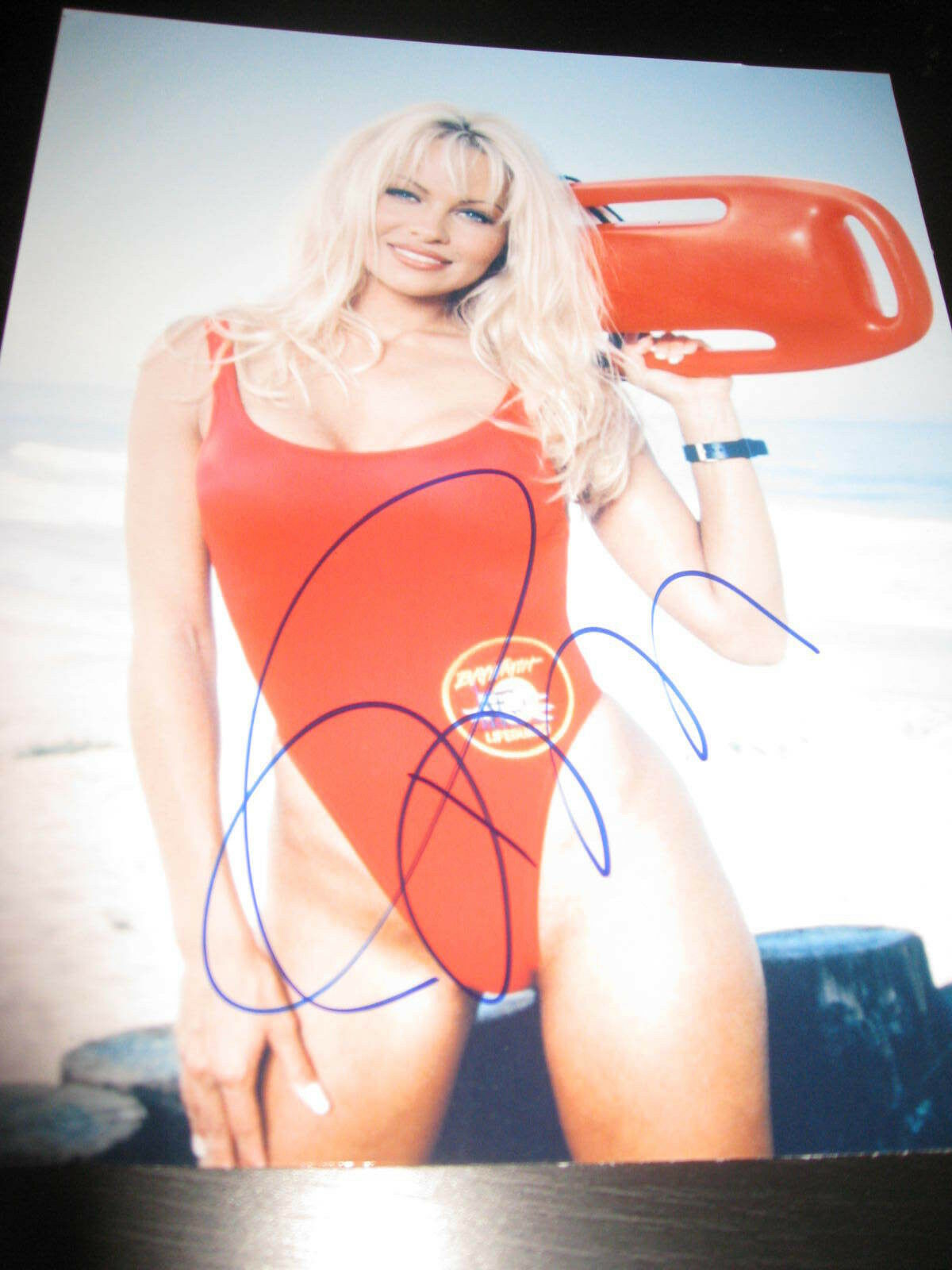 PAMELA ANDERSON SIGNED AUTOGRAPH 8x10 PHOTO BAYWATCH RED BATHING SUIT SEXY BABE | Autographia