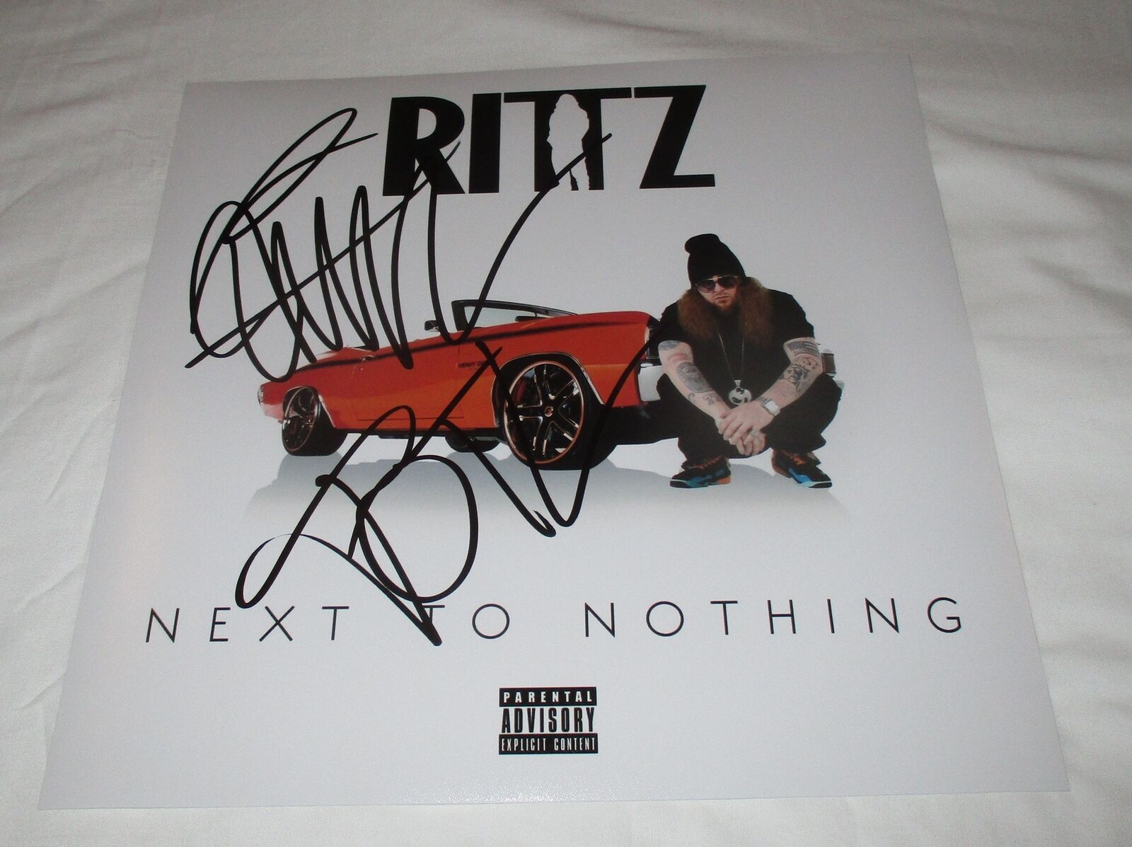 RITTZ SIGNED NEXT TO NOTHING 12X12 PHOTO | Autographia