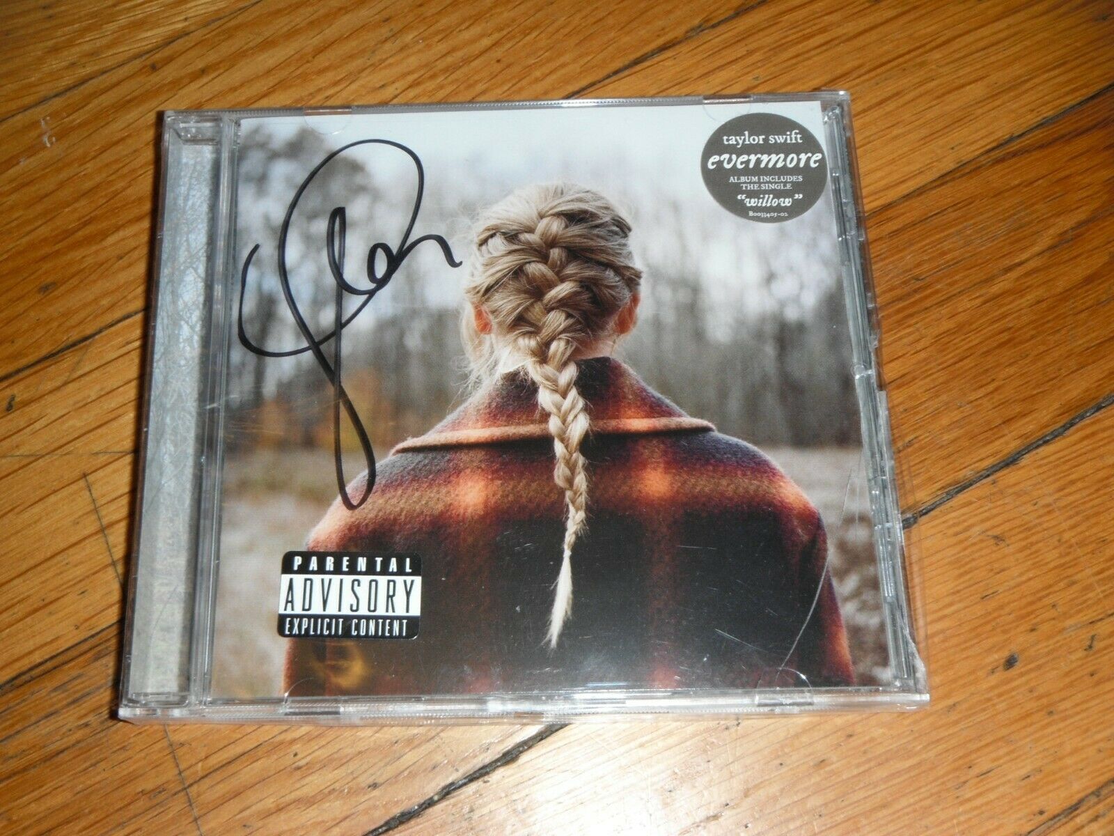 TAYLOR SWIFT SIGNED EVERMORE CD COVER STILL SEALED - Autographia