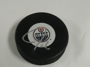 JORDAN EBERLE SIGNED EDMONTON OILERS LOGO PUCK AUTOGRAPHED | Autographia